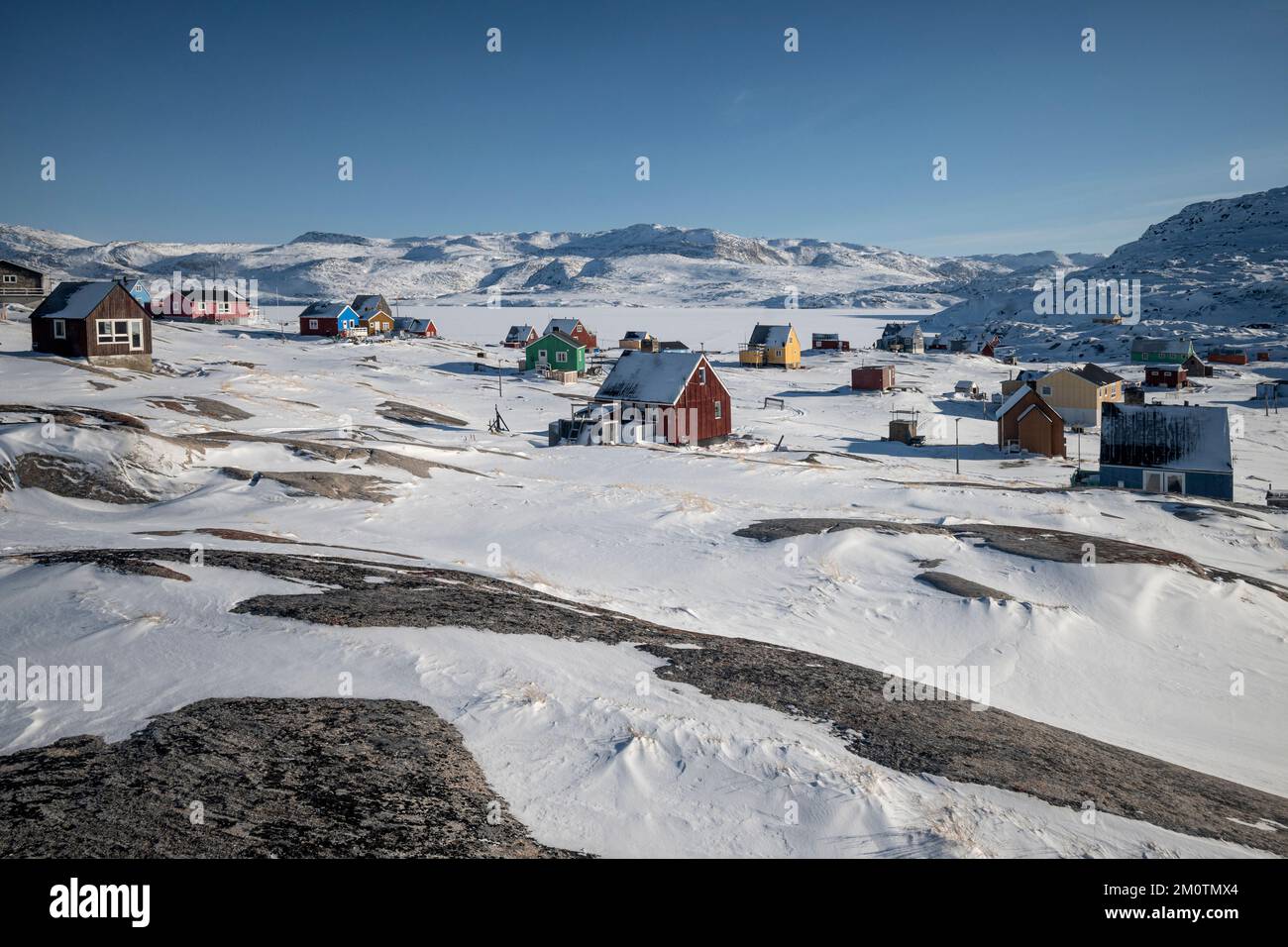 Colourful wooden houses in the tiny inuit settlement of Oqaatsut Stock ...