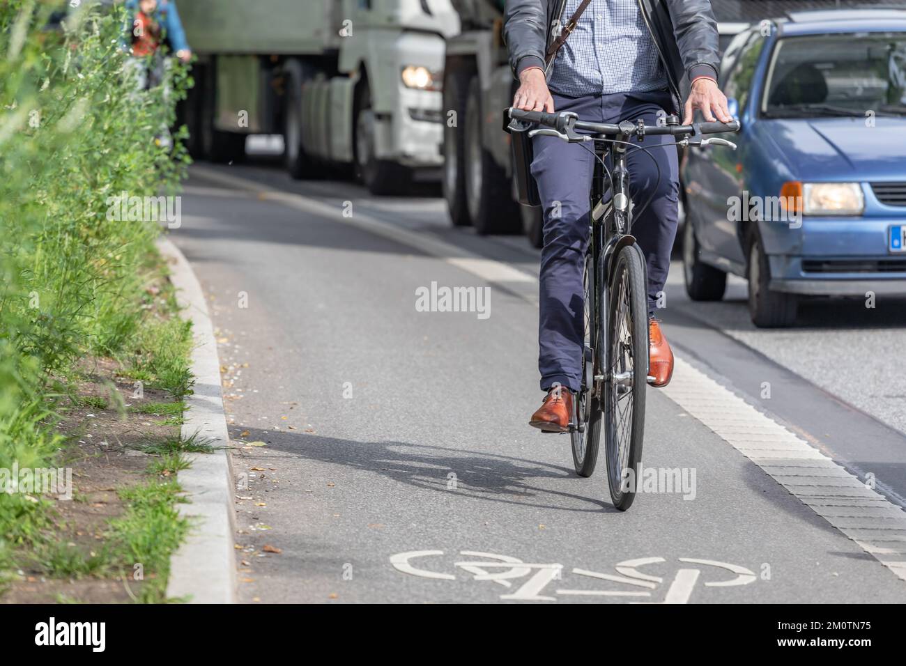 Biker and bike lane hi-res stock photography and images - Alamy