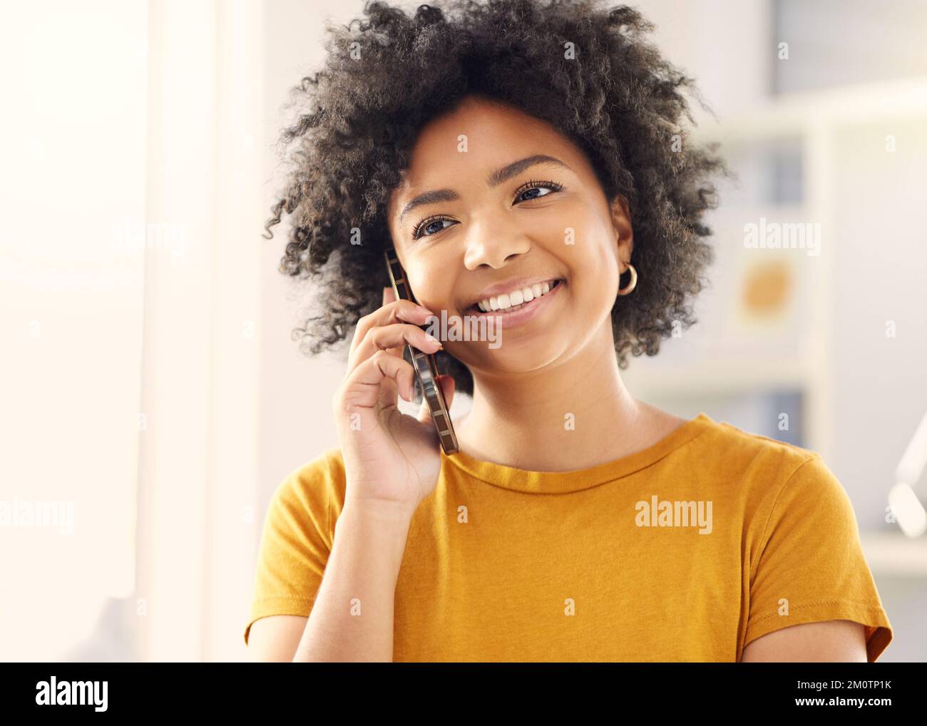 Just pick up your phone and make that call. a young woman on a call at ...