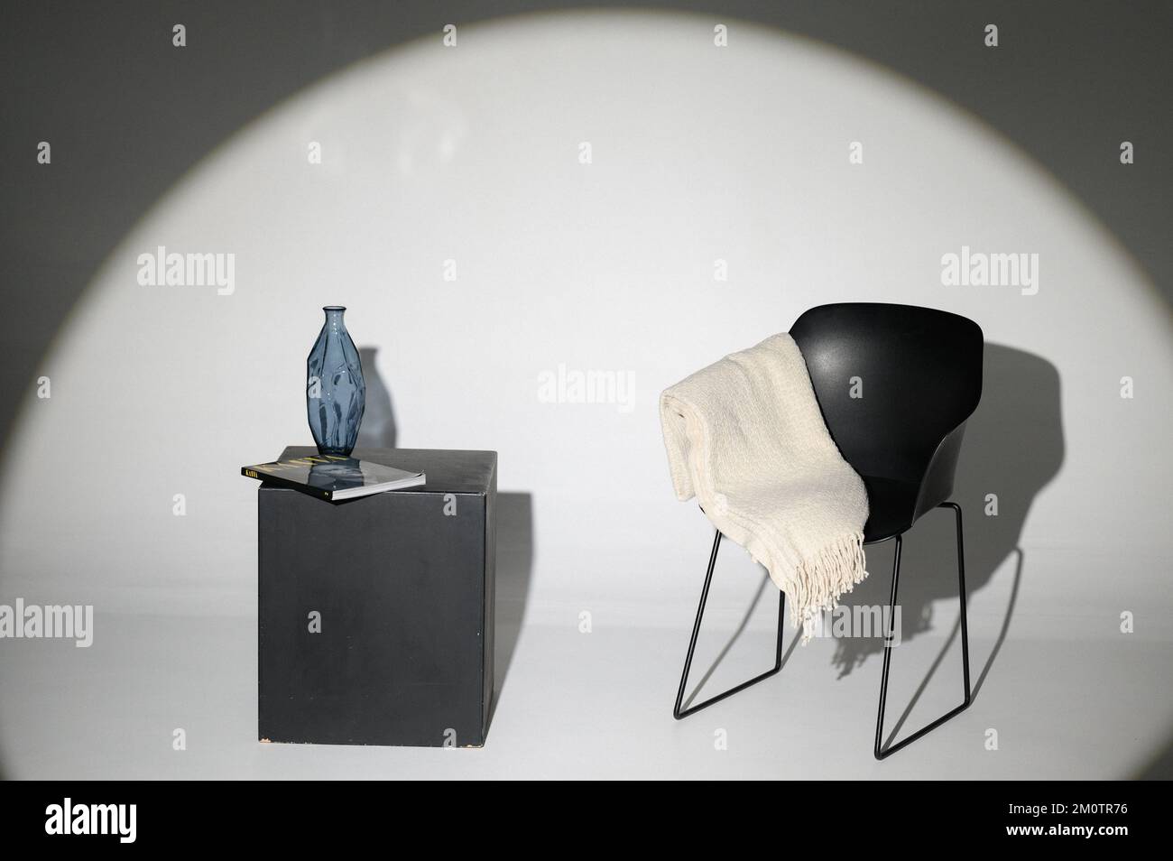 Elegant black chair on a white background in a photo studio, a chair ...