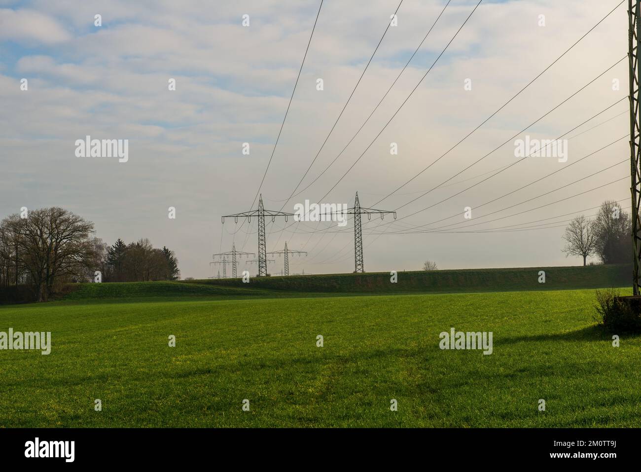 Power lines crossing the landscape Stock Photo - Alamy
