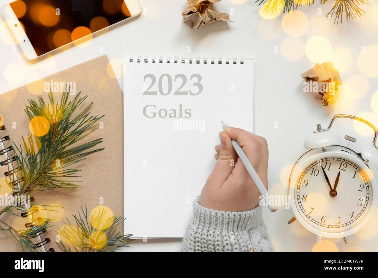 Back to life, goal list concept. Woman's hand writing in empty notebook ...