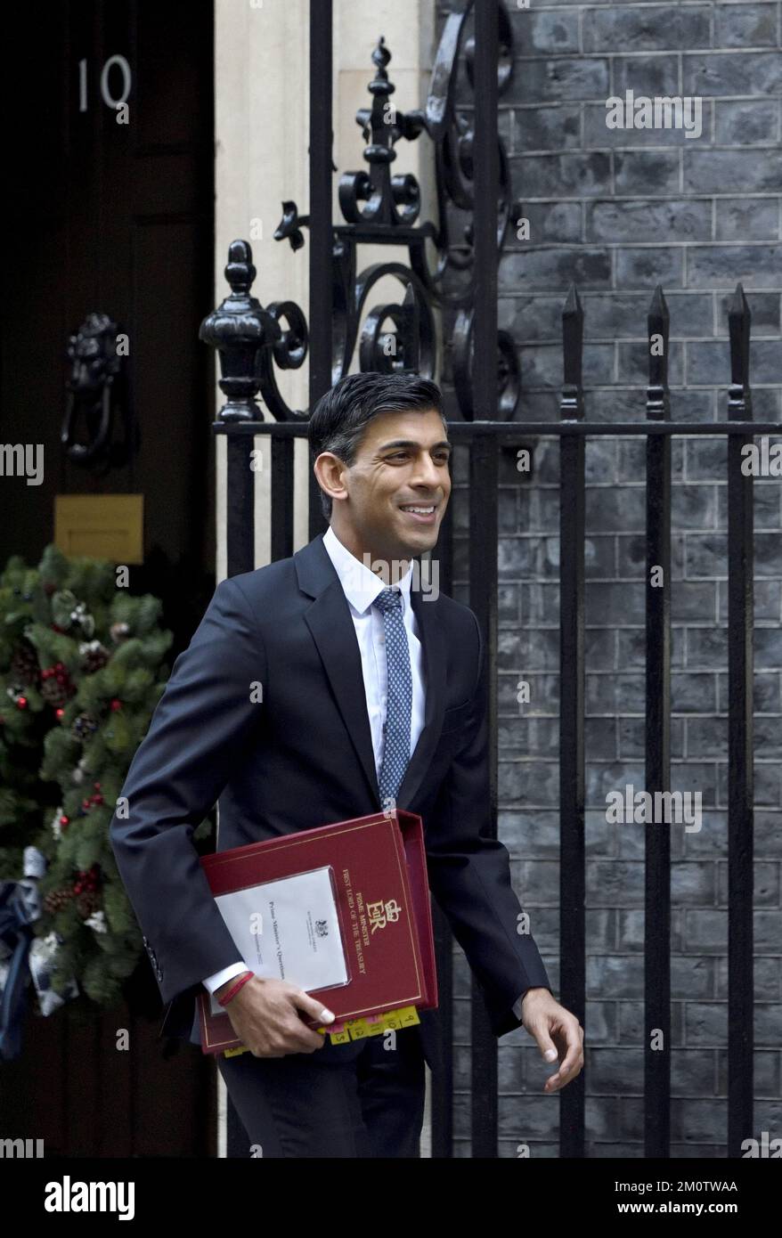 Rishi Sunak MP - British Prime Minister - leaving 10 Downing Street with a prepared file for ...