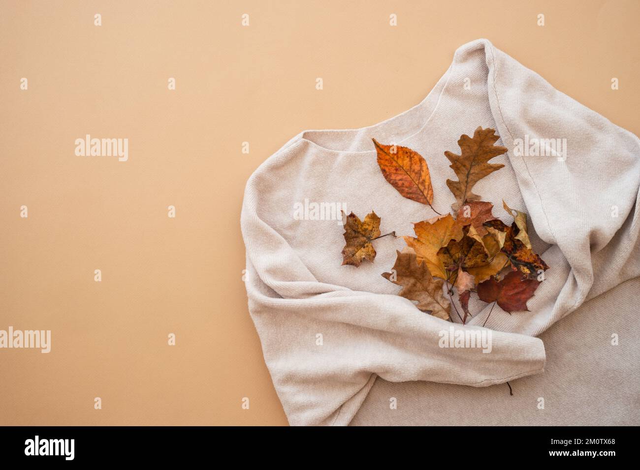 Autumn flat lay background with sweater and fall leaves Stock Photo - Alamy
