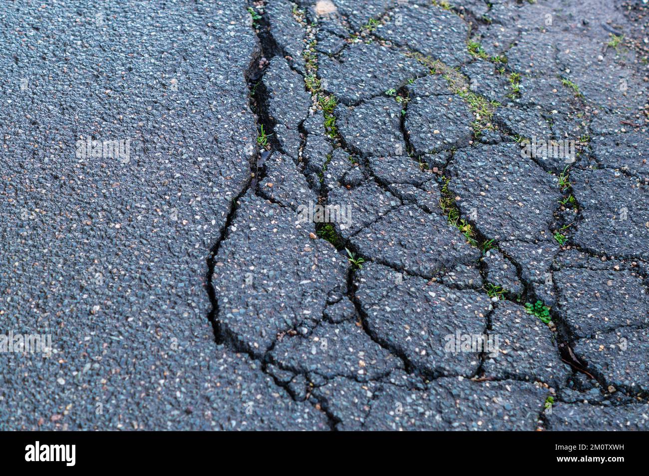 Potholed street hi-res stock photography and images - Alamy