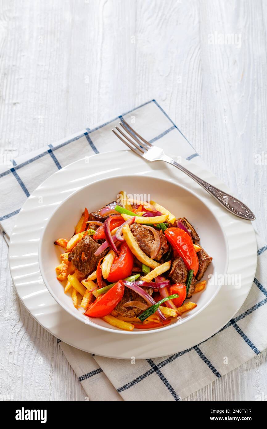 Lomo saltado, Peruvian dish of stir-fried slices of beef sirloin ...
