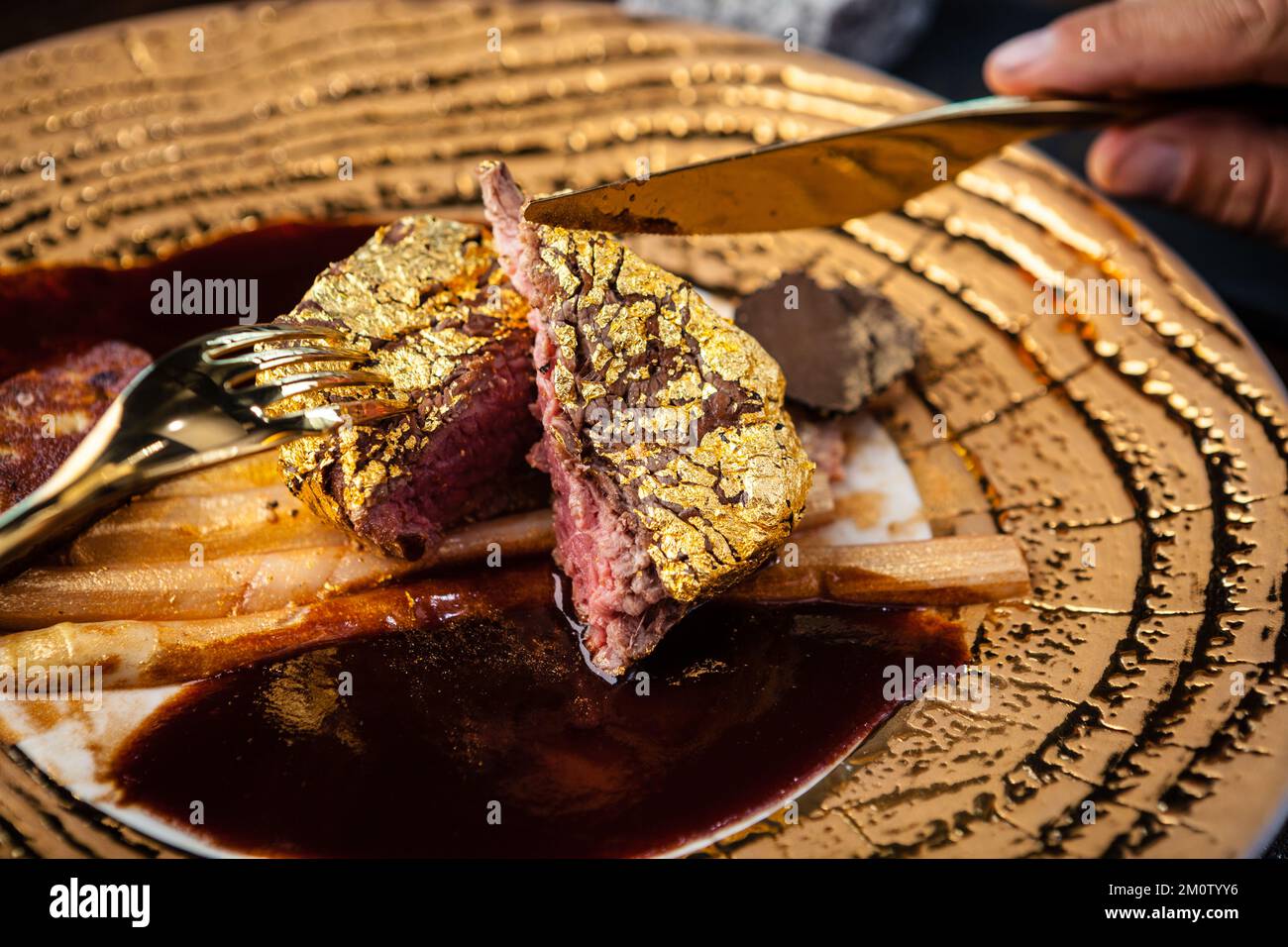 Black Angus 24 carat gold steak. Beef tenderloin, foie gras, fresh ...