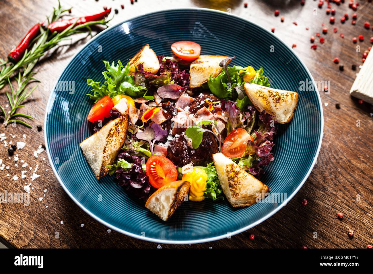 Warm chicken liver salad with port wine-honey sauce. Carrot cream ...