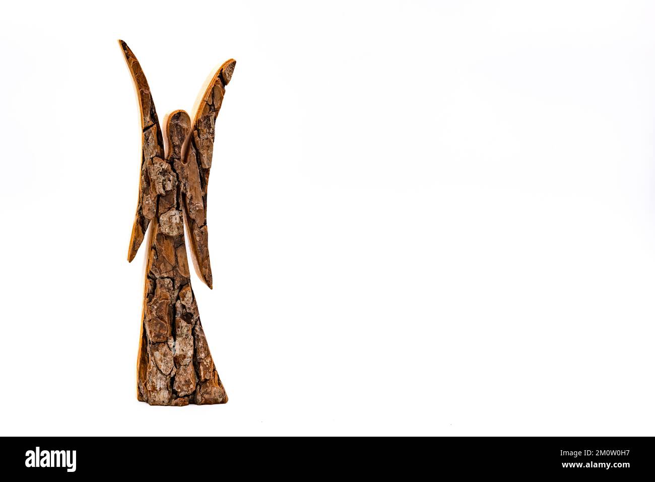Craft work angel made of wood isolated on white background as greeting ...