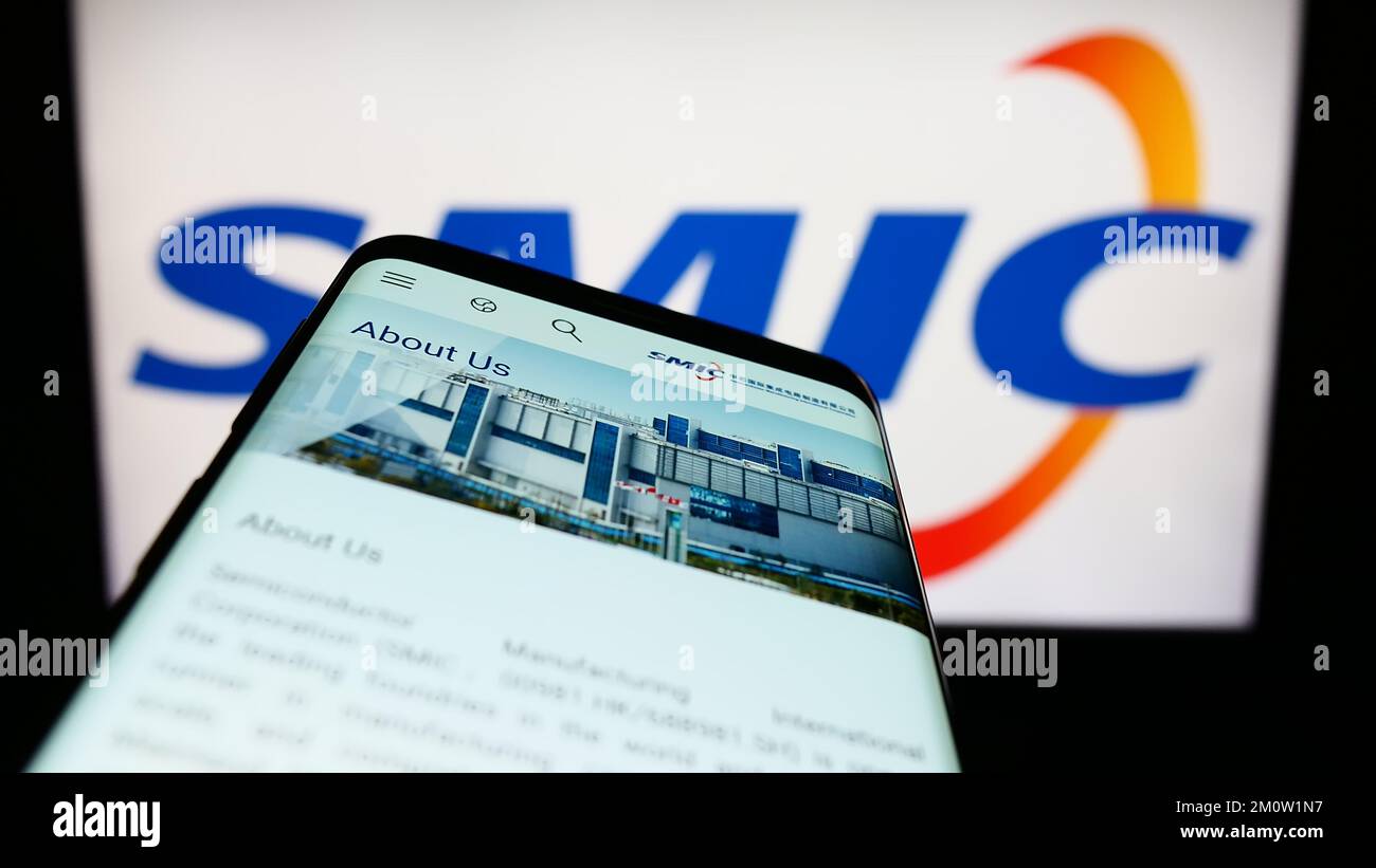 Mobile phone with webpage of Semiconductor Manufacturing International ...
