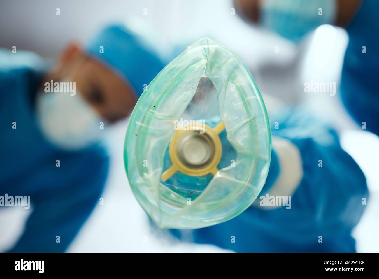 Closeup oxygen mask, ventilation and doctors in hospital of emergency ...