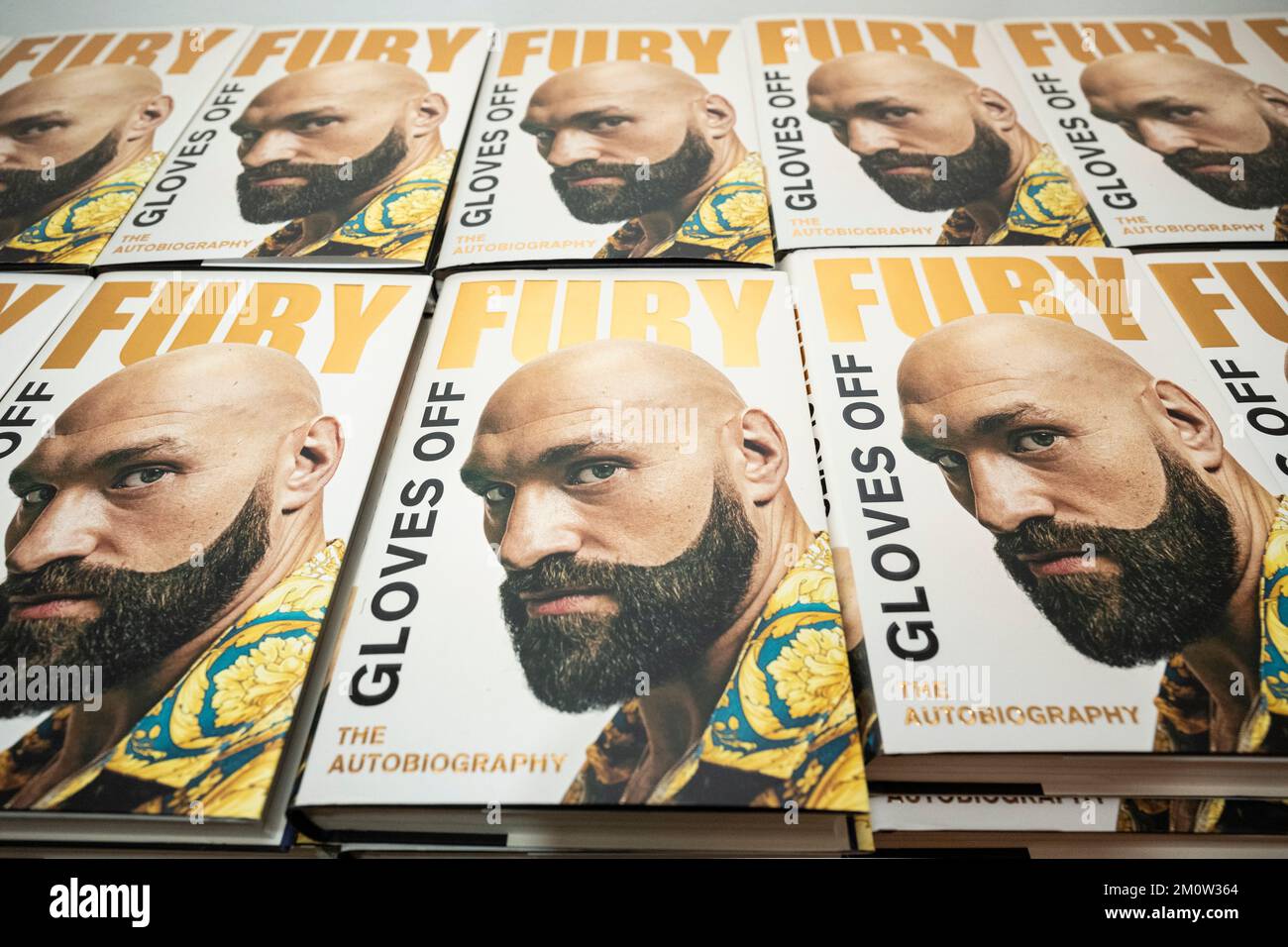 London, UK. 8 December 2022. Books to be signed by heavyweight boxing ...