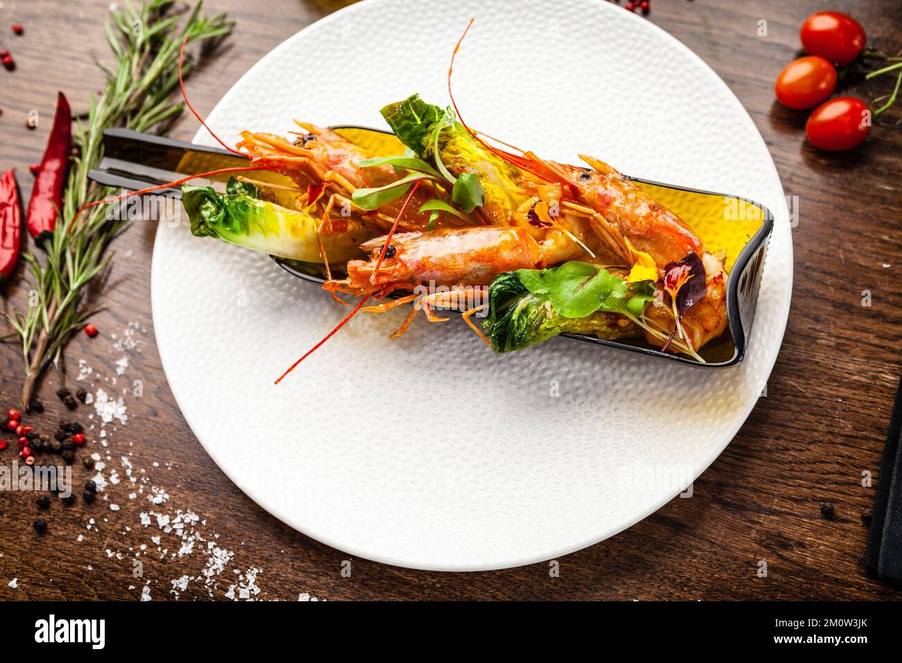 Argentinian king prawns, glazed. Lime, chilly and garlic. Served in a ...
