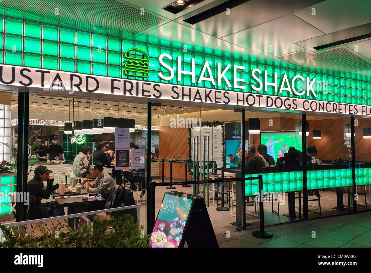 SHANGHAI, CHINA - DECEMBER 8, 2022 - Citizens are seen at a Shake Shack ...