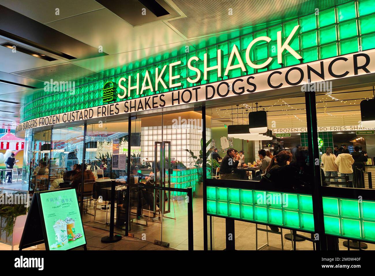SHANGHAI, CHINA - DECEMBER 8, 2022 - Citizens are seen at a Shake Shack ...