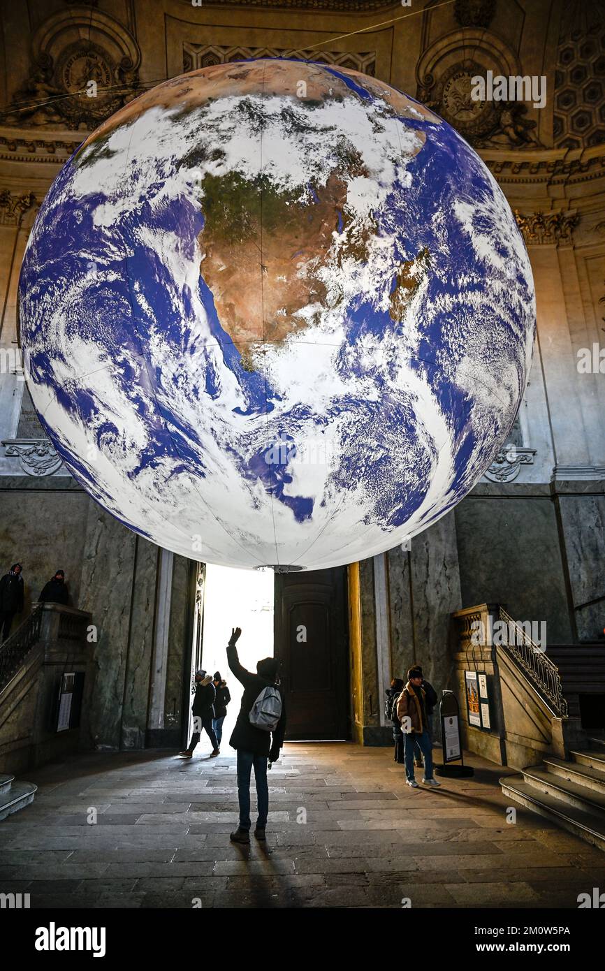 Stockholm, Sweden, 08/12/2022, Visitors look at the artwork Gaia ...