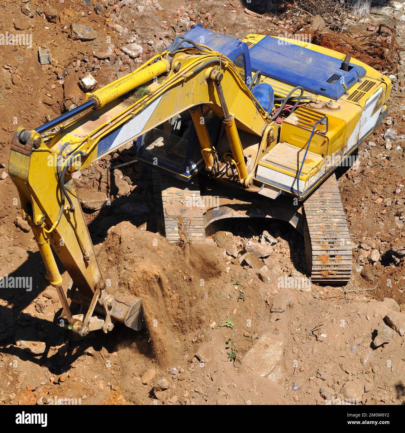 Excavator continues to work at the construction site, excavation site and excavator Stock Photo ...