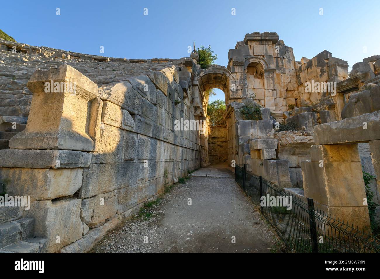 Ruins of the ancient city of Myra in Demre, Turkey. Ancient tombs and amphitheater Stock Photo ...