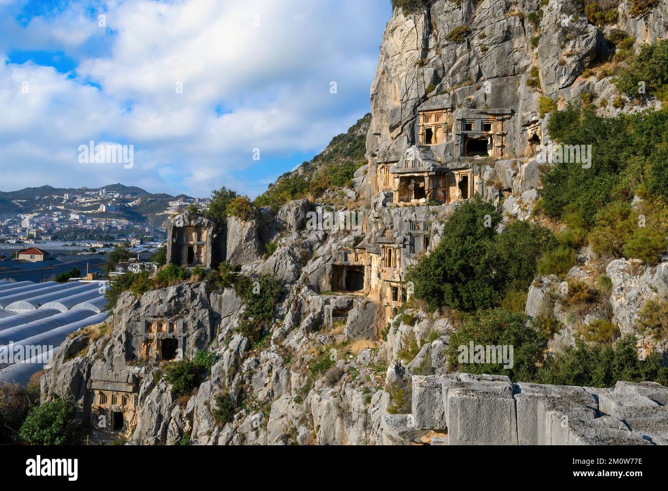Ruins of the ancient city of Myra in Demre, Turkey. Ancient tombs and amphitheater Stock Photo ...