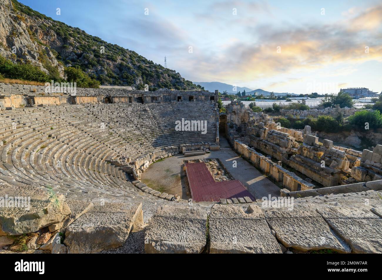 Ruins of the ancient city of Myra in Demre, Turkey. Ancient tombs and amphitheater Stock Photo ...