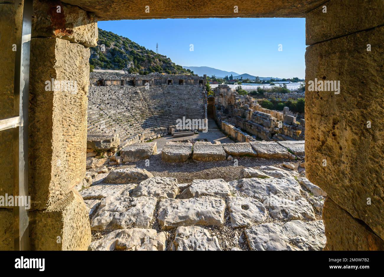 Ruins of the ancient city of Myra in Demre, Turkey. Ancient tombs and amphitheater Stock Photo ...