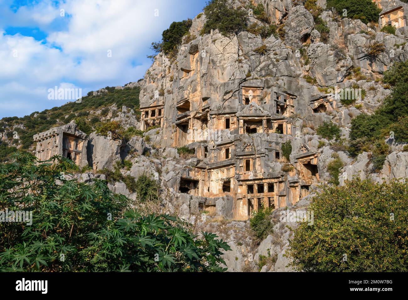 Ruins of the ancient city of Myra in Demre, Turkey. Ancient tombs and amphitheater Stock Photo ...