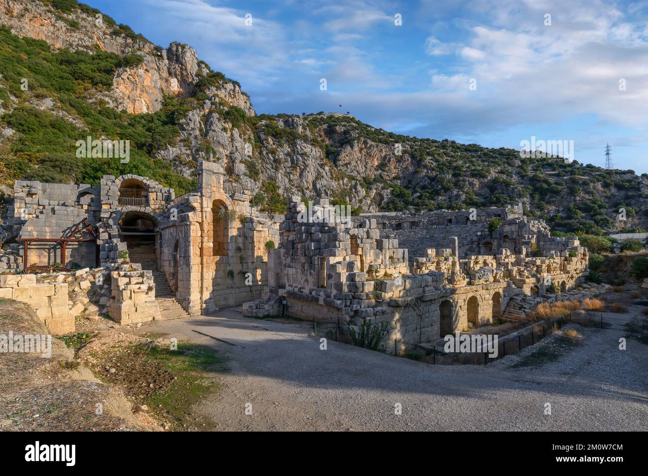 Ruins of the ancient city of Myra in Demre, Turkey. Ancient tombs and amphitheater Stock Photo ...