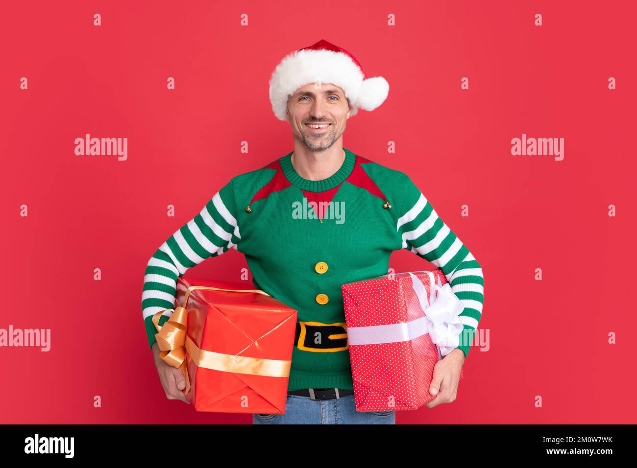 happy new year. merry christmas gift. happy cheerful man in elf costume ...