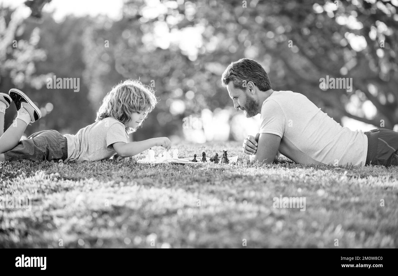 spending time together. strategic and tactic. tutorship. dad and kid ...