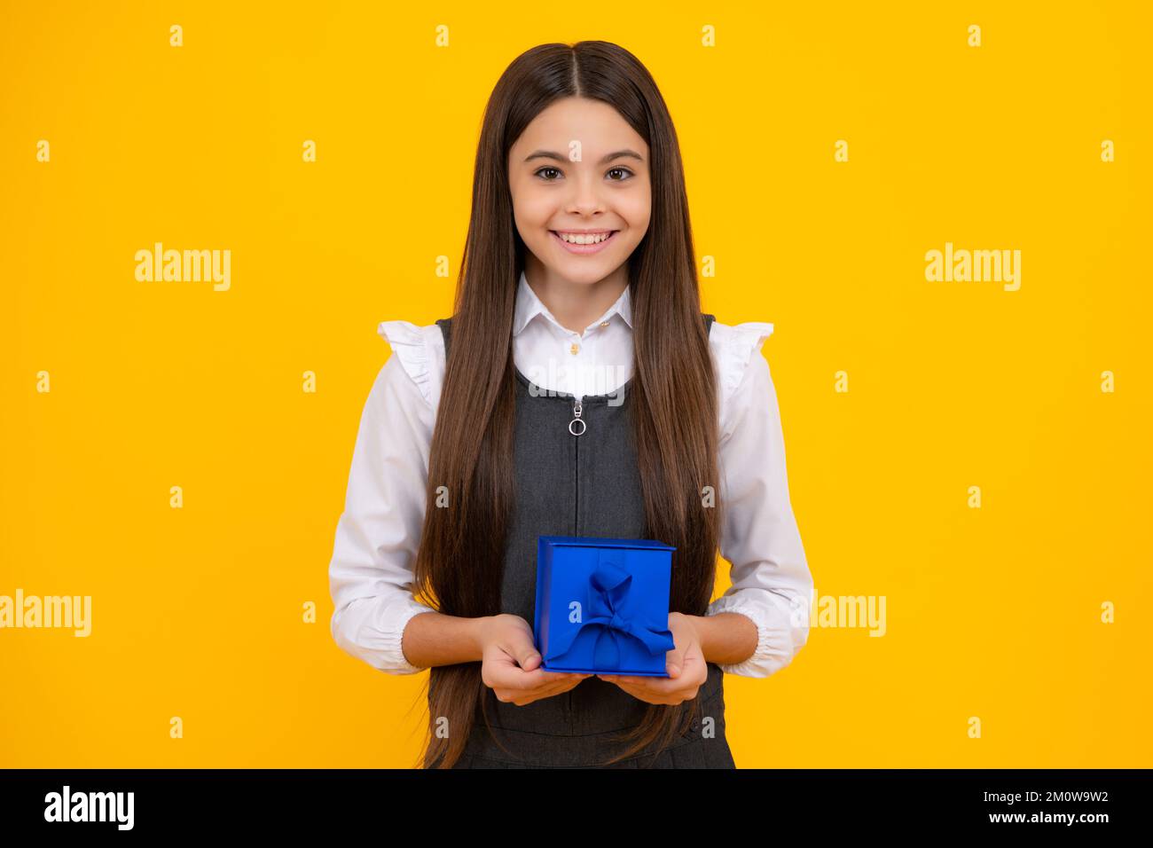 Child with gift present box on isolated background. Presents for ...