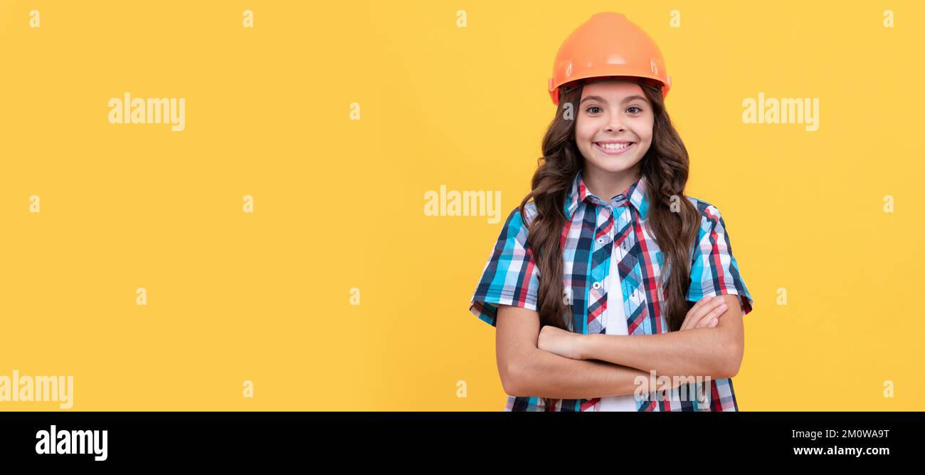 Engineer teenager girl. happy child with curly hair in construction ...