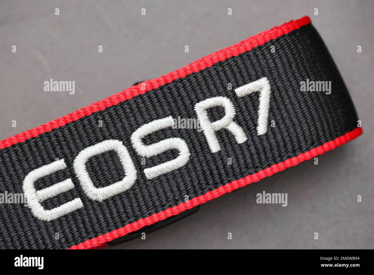 A closeup of Canon EOS R7 mirrorless camera strap Stock Photo - Alamy