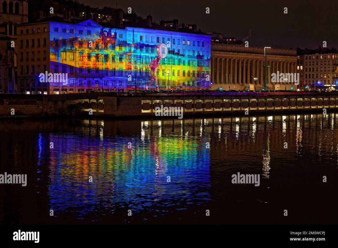 LYON, FRANCE, December 7, 2022 : Saone river banks during Festival of Lights. The Fete des ...