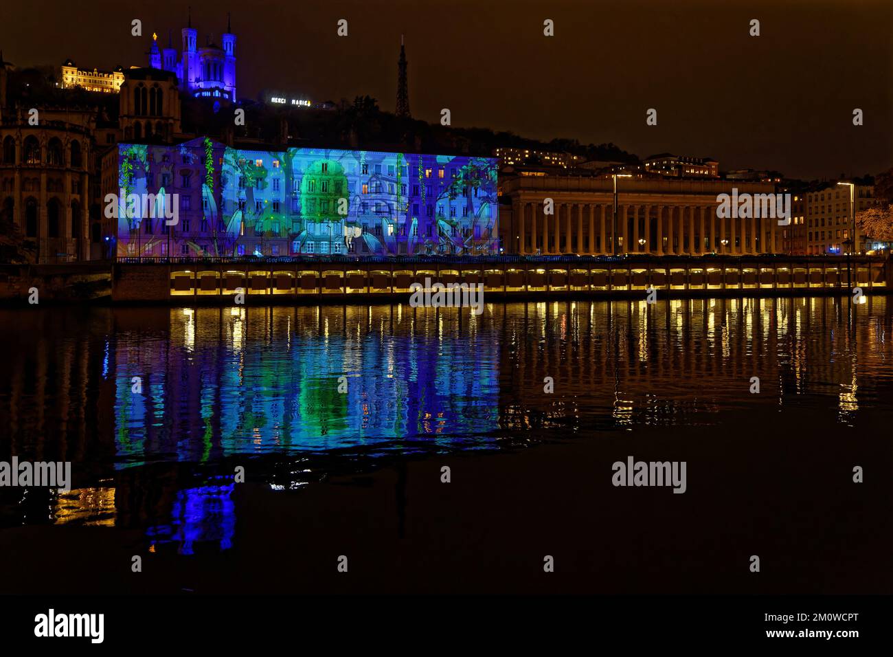 LYON, FRANCE, December 7, 2022 : Saone river banks during Festival of Lights. The Fete des ...