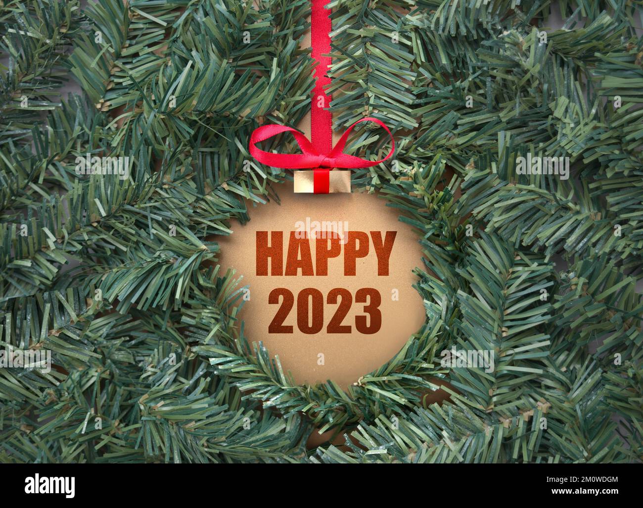 Happy 2023 banner inside bauble shape space made using christmas tree ...
