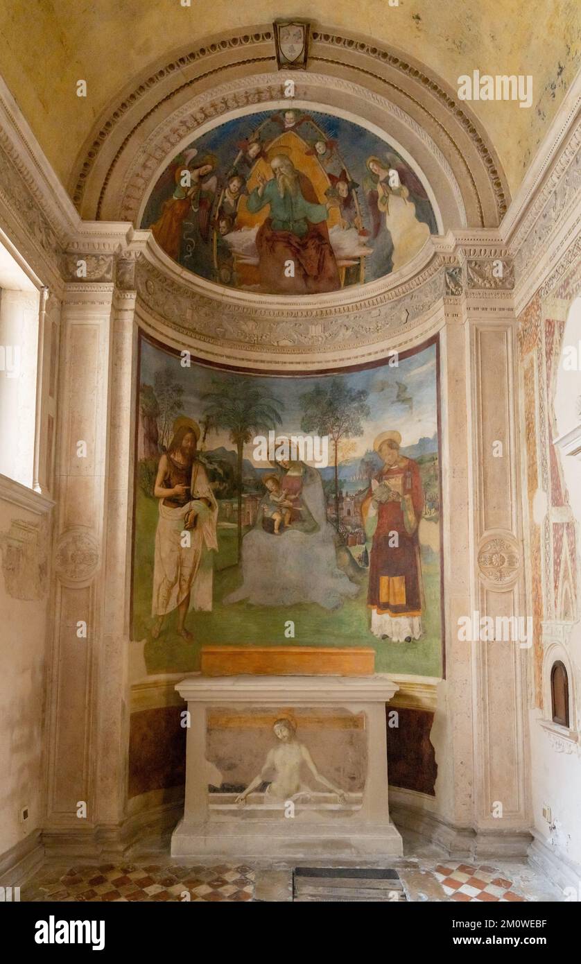 Spoleto, Italy - 25 November, 2022: side chapel with small altar and ...