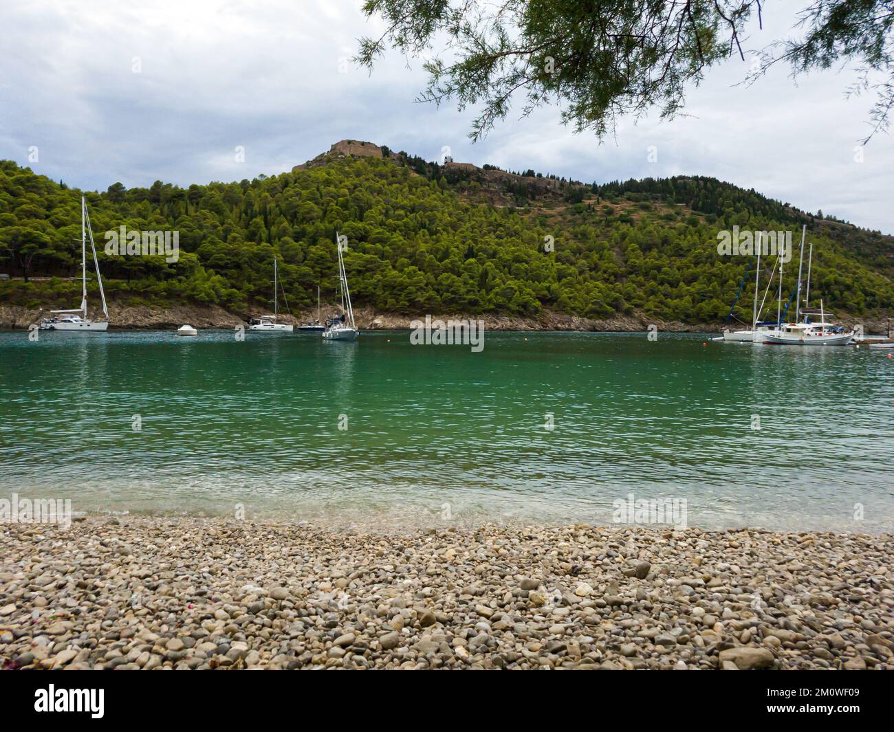 A view at green bay of Asos village, greek nature and turquoise Ionian ...