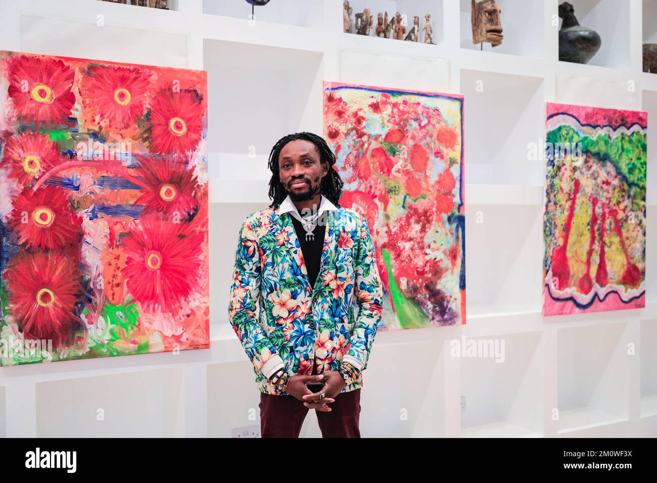 London, UK. 08th Dec, 2022. Artist Hyacinthe Ouattara with Sunflower I ...