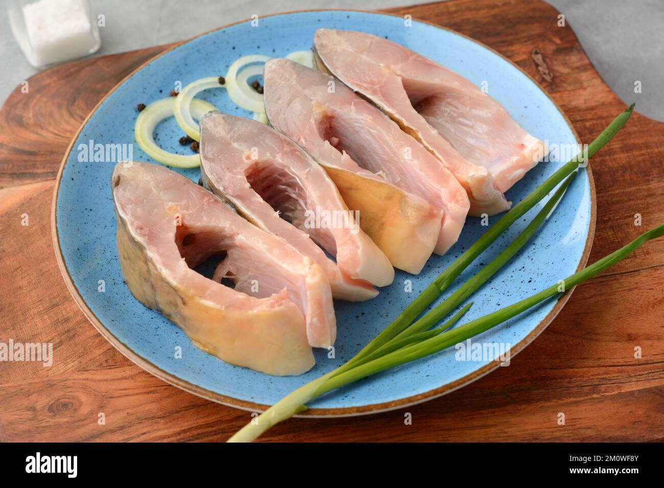 Fresh, raw carp fish slices. Preparing fish for frying. Traditional ...