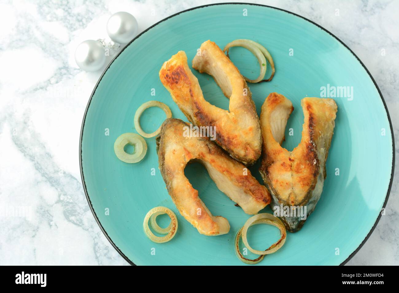Fried carp fish slices. Traditional Polish Christmas Eve dish Stock ...