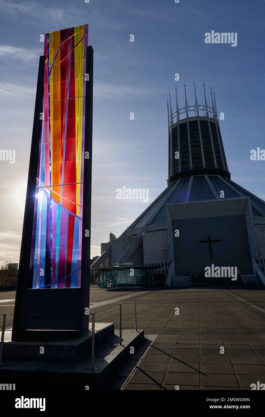Sunlight shines through a stained glass column on the roof of the ...