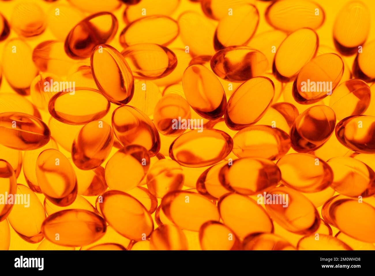 Fish Oil capsules Omega 3 Macro Backlit Background Stock Photo - Alamy