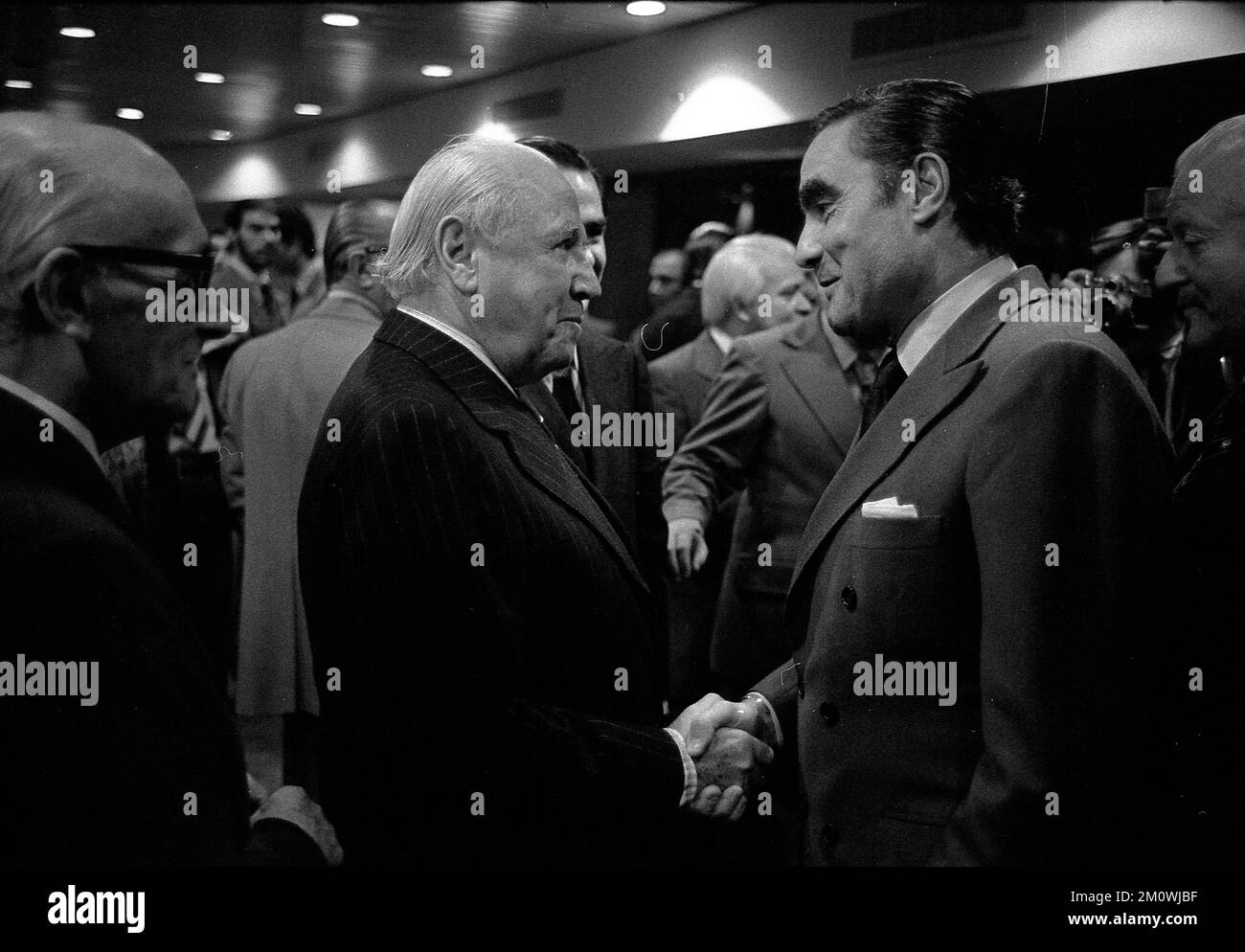 Argentine Navy Commander Eduardo Emilio Massera (right) greets ...