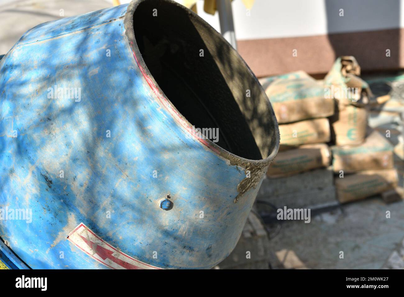 Detail of a hand-held concrete temperer during house construction Stock ...