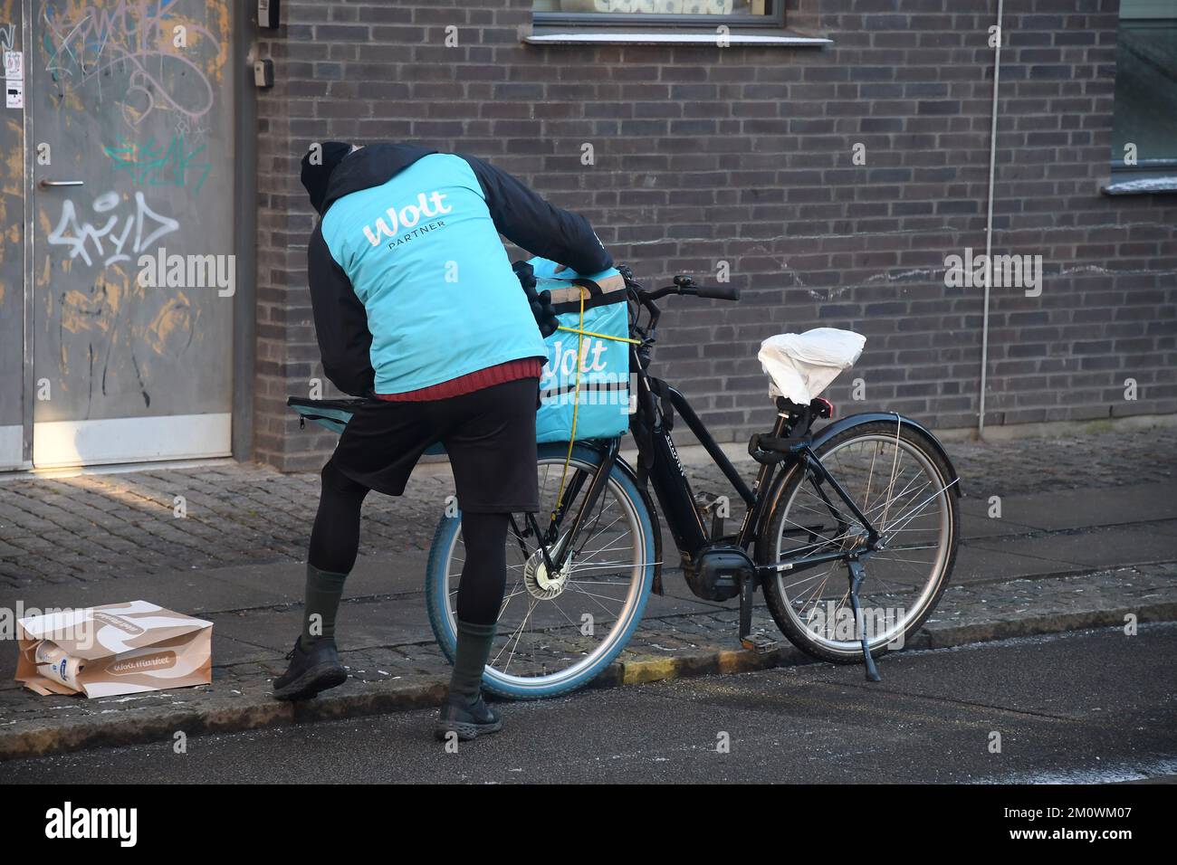 Copenhagen/Denmark/08 December 2022/Wolt partner delivert biker in ...