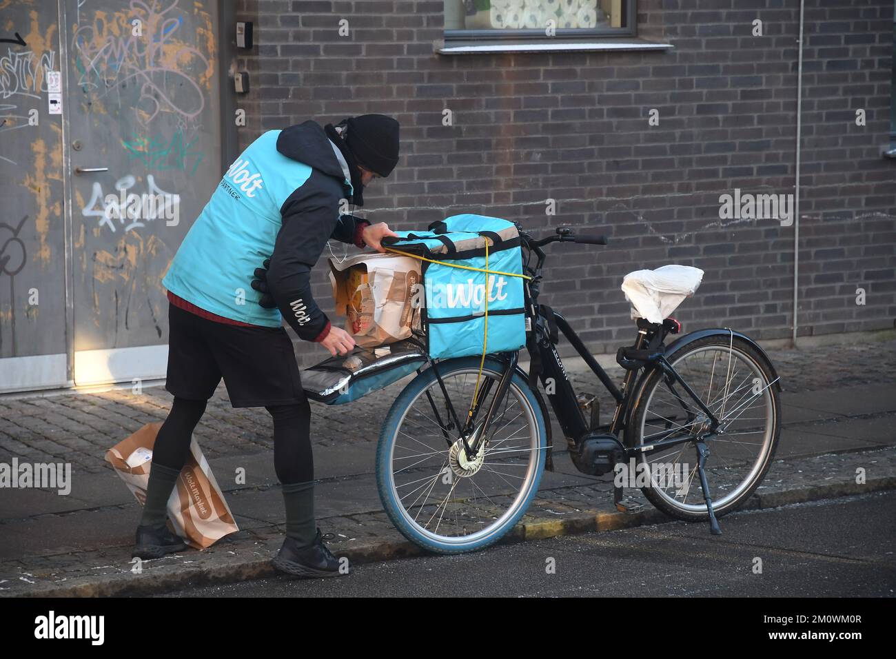 Copenhagen/Denmark/08 December 2022/Wolt partner delivert biker in ...