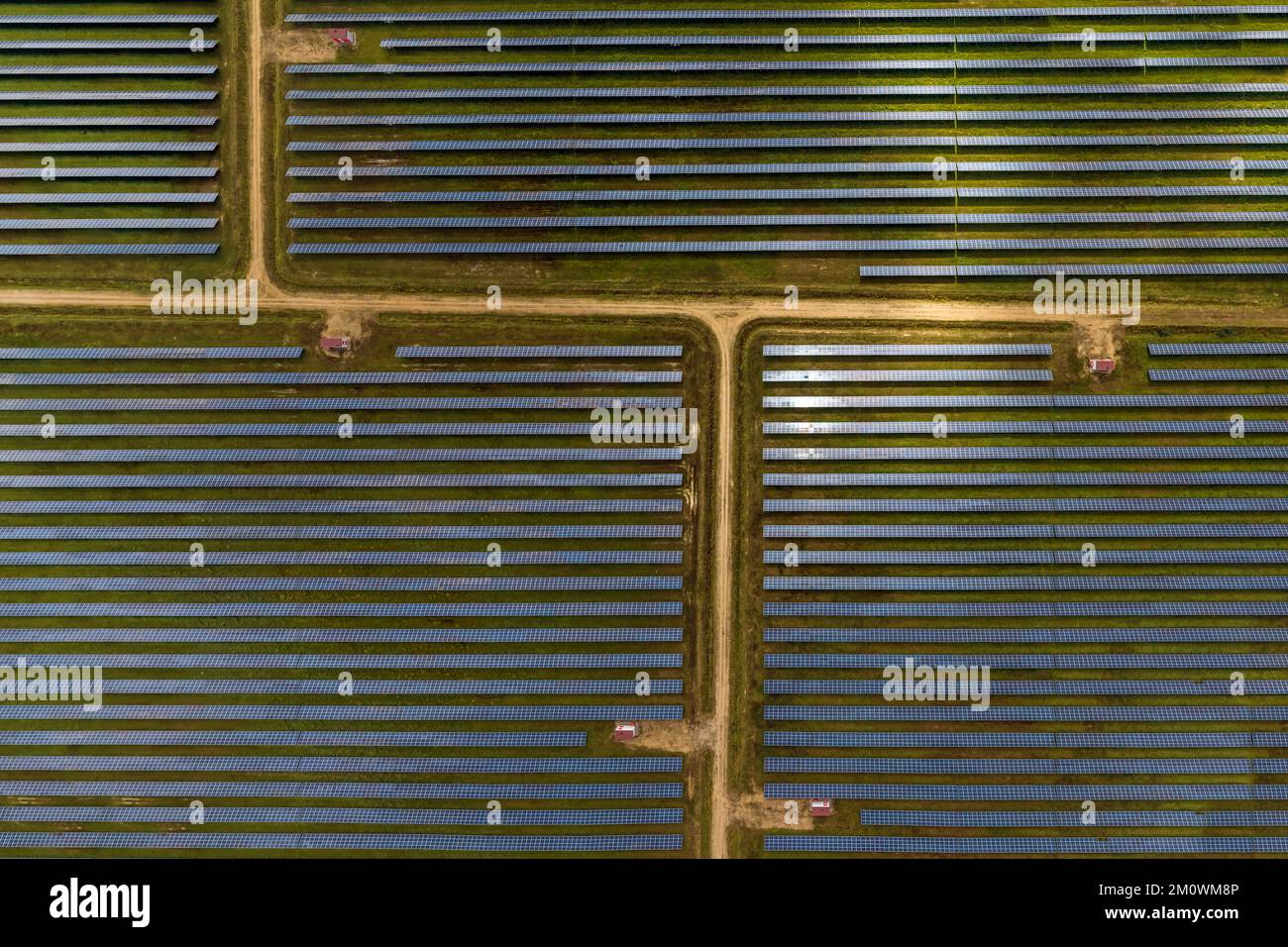 aerial view on huge farm field of rows of solar panels. Renewable solar ...
