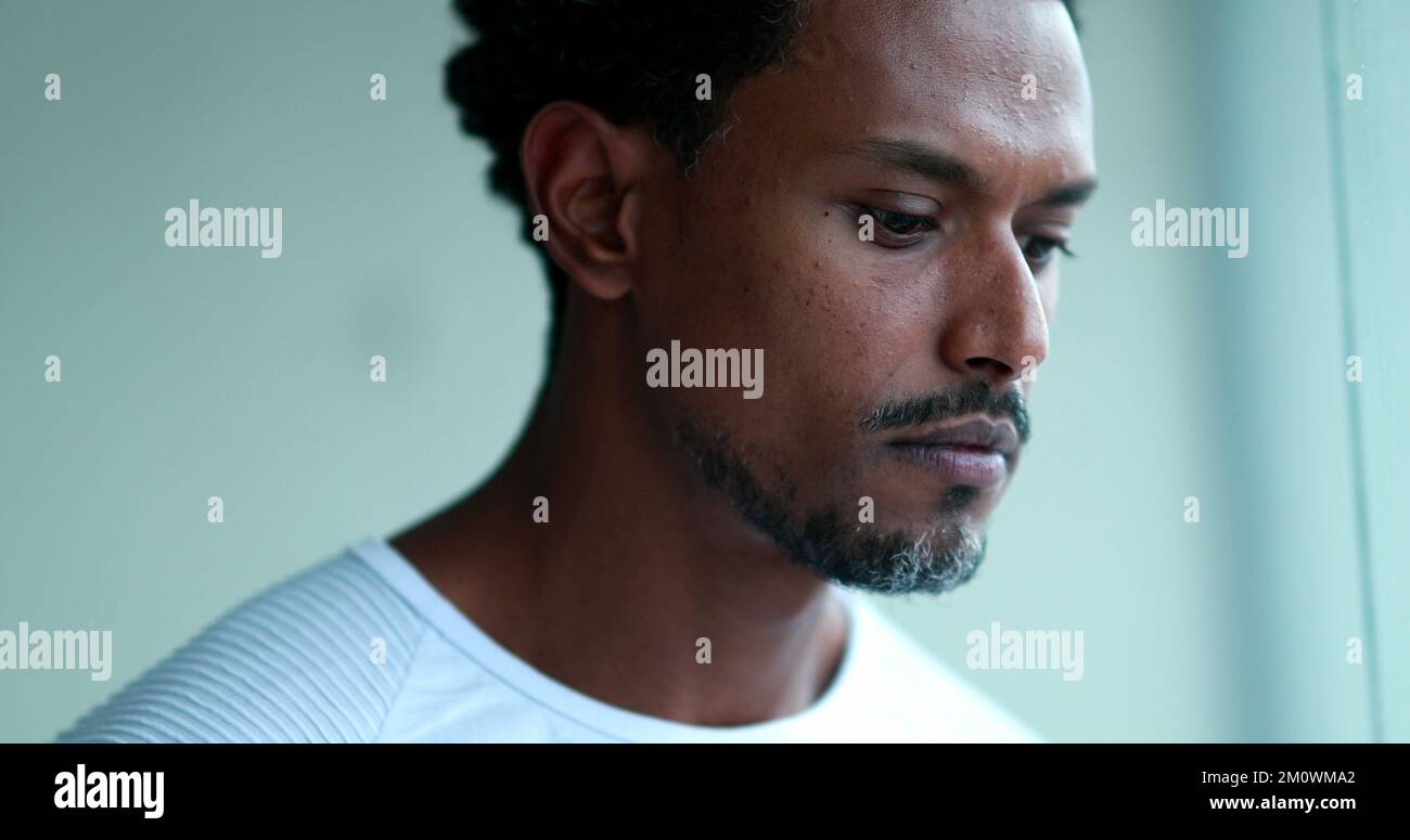 Pensive black man face, thoughtful African American man thinking ...