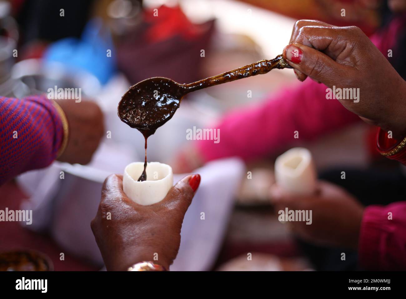 On December.8,2022 in Kathmandu, Nepal. Women makes newari cuisine ...