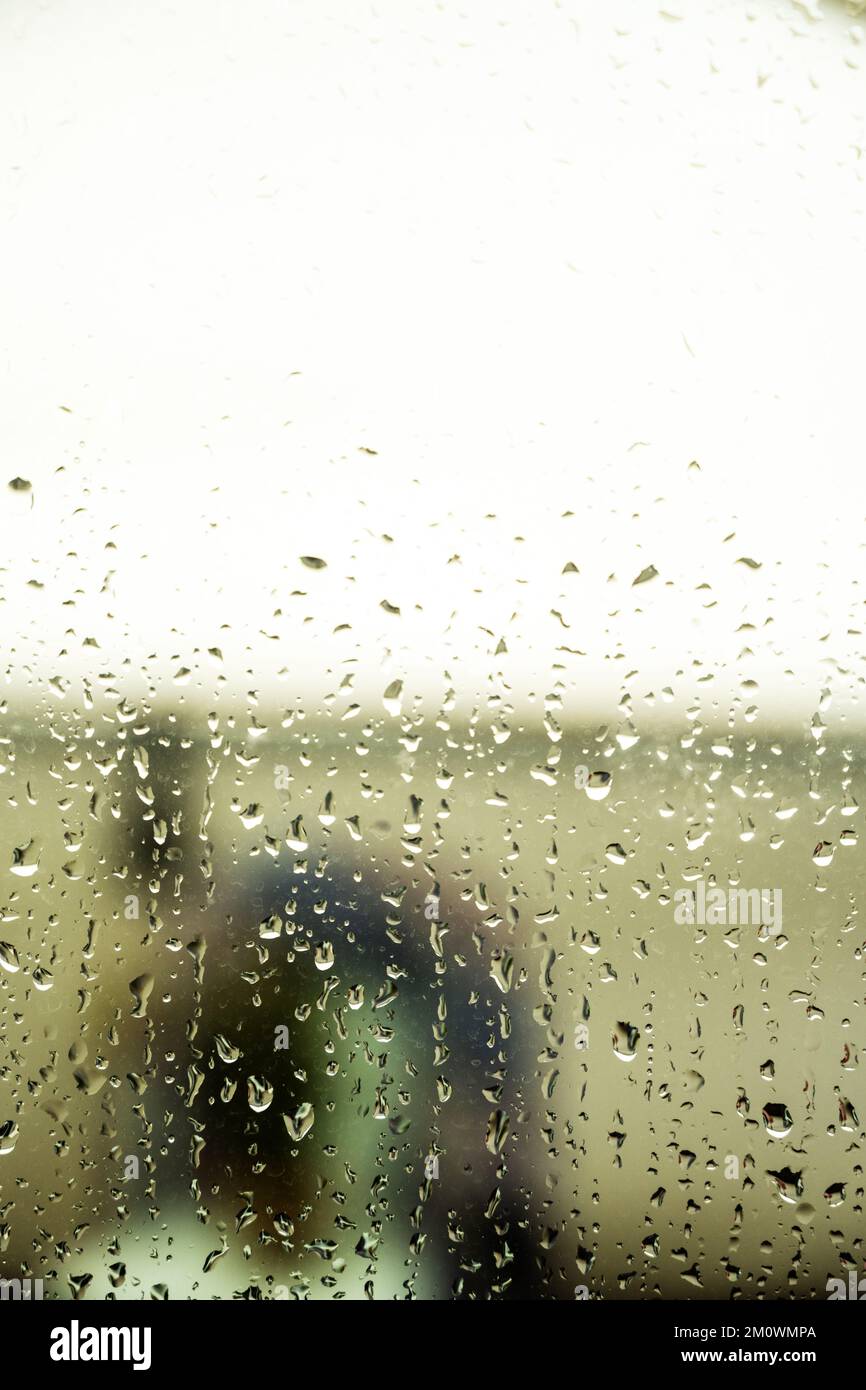 Irregular raindrops on the glass surface of a window Stock Photo - Alamy